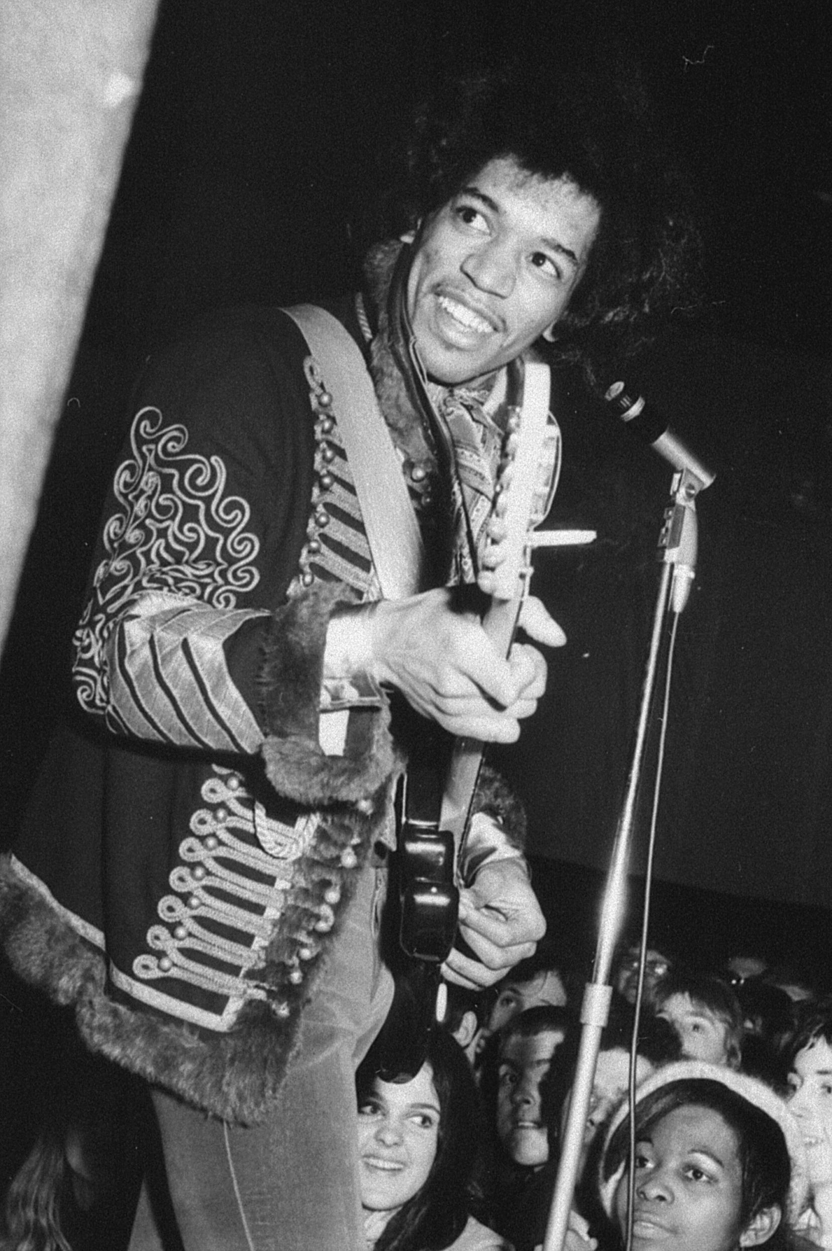 Jimi Hendrix mid-set at his Roundhouse gig with his band The Experience ...